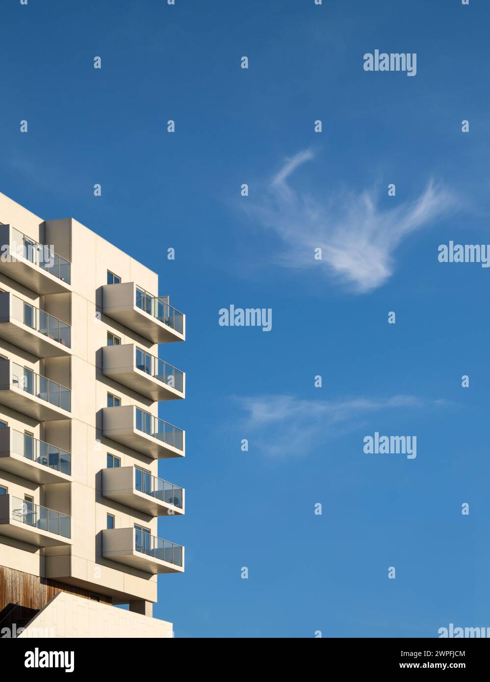 Copenhagen, Denmark - Balconies on high rise modern building with white ...