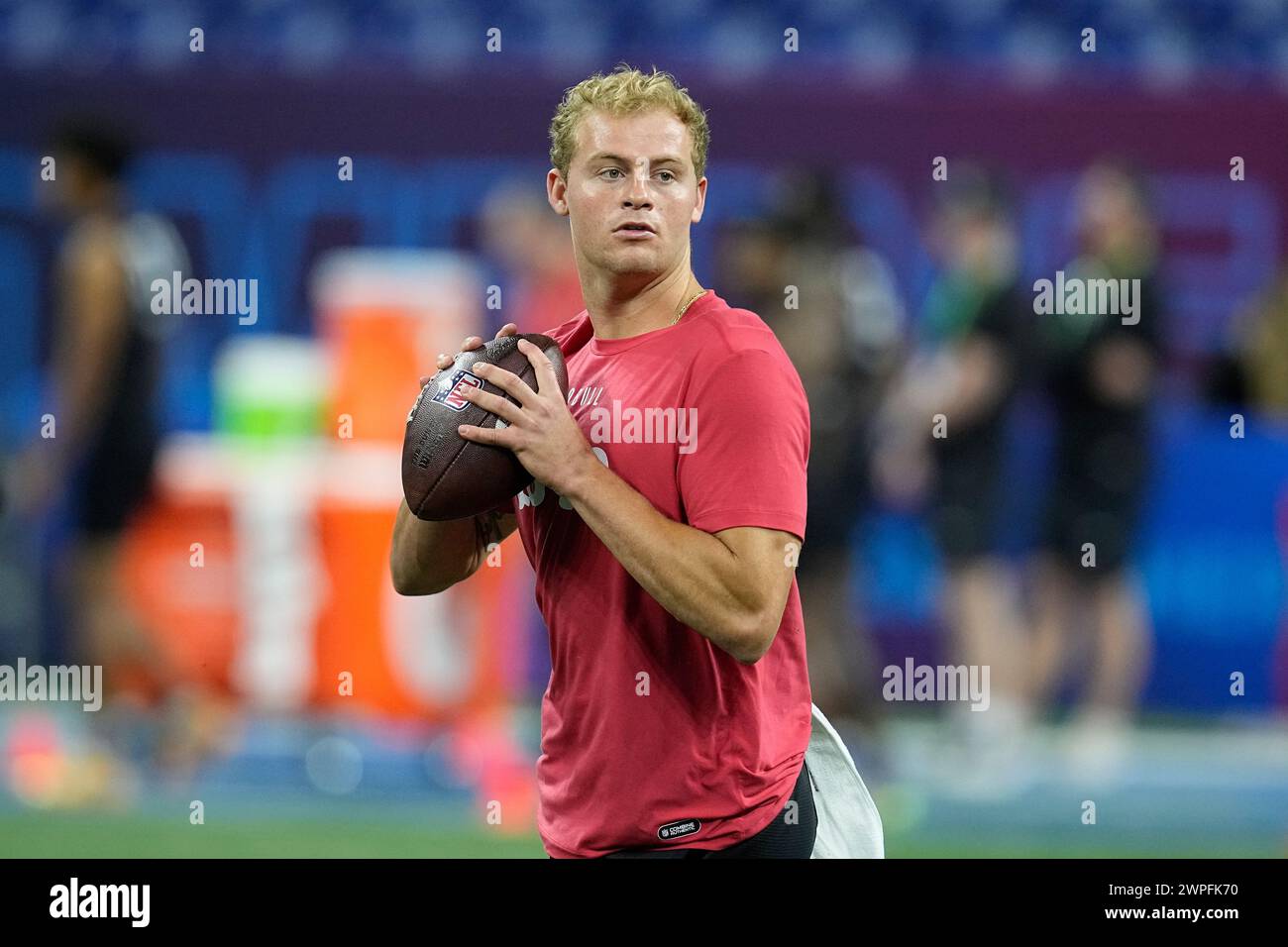 Tulane quarterback Mike Pratt runs a drill at the NFL football scouting ...