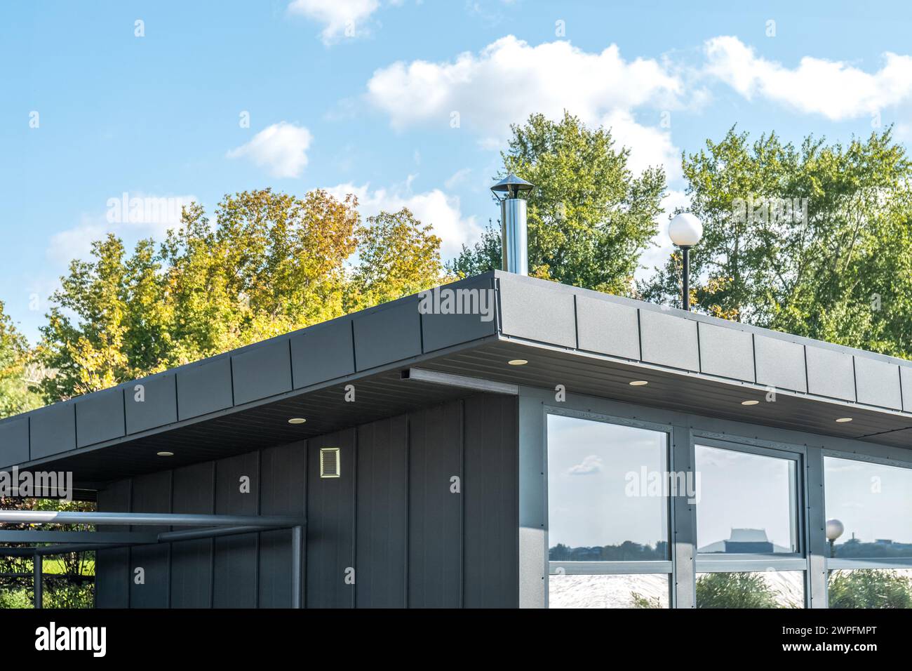 Modern guest house with standing seam facade panoramic glazing and ...