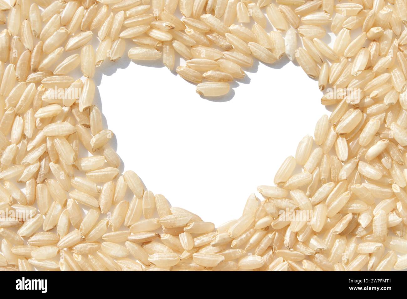 A heart-shaped rice pile, symbolizing love, unity, and hope. The grains ...