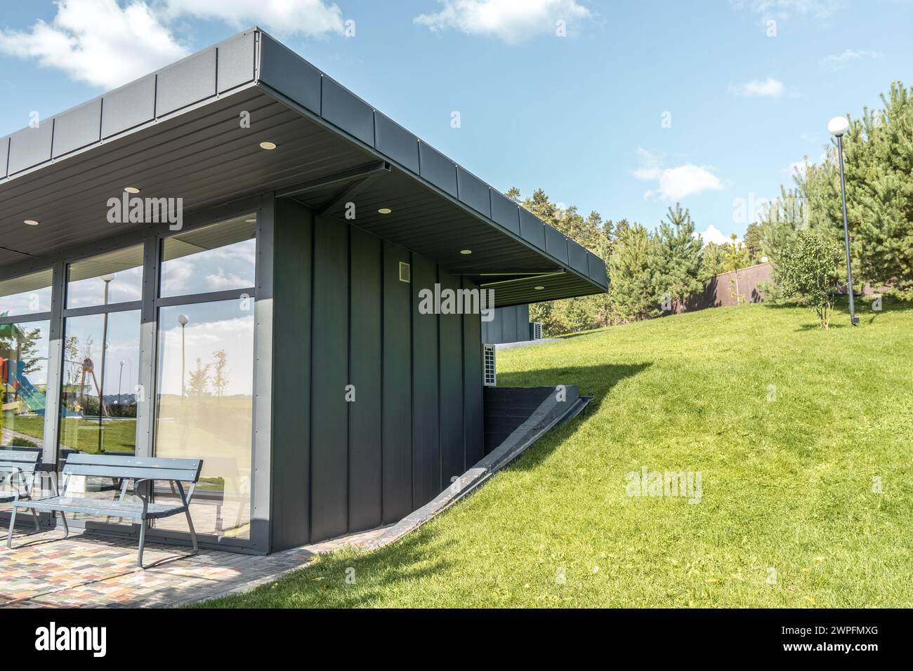 Modern guest house with standing seam facade panoramic glazing and ...