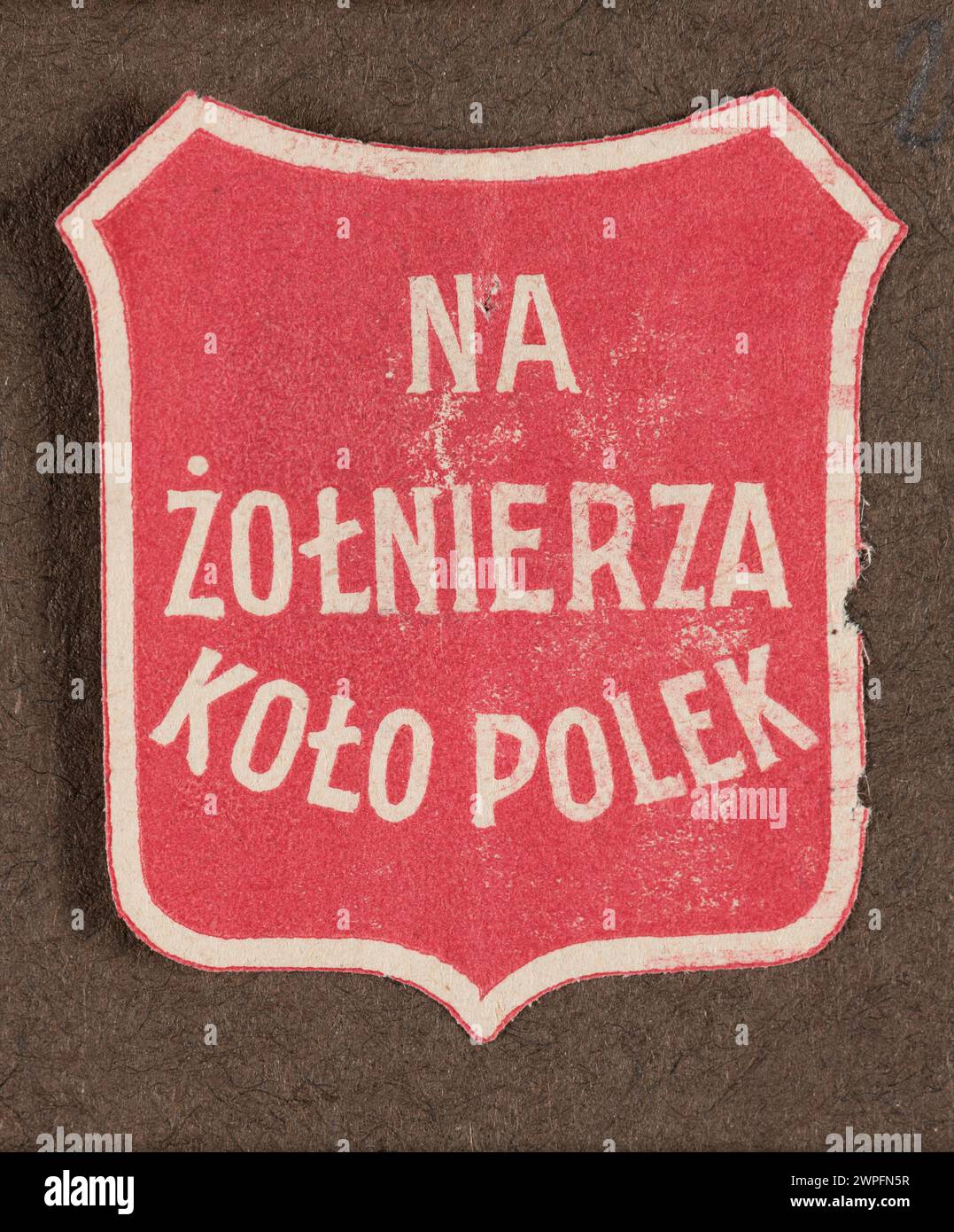 Circa 1919 shield-shaped stamp with inscription for soldiers near ...