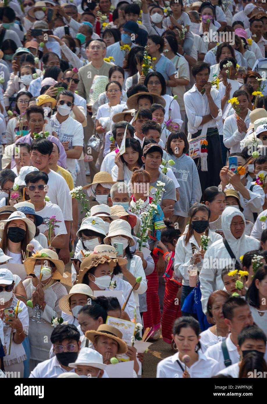 Buddhist faithful pay obeisance to the sacred relics of Lord Buddha and ...