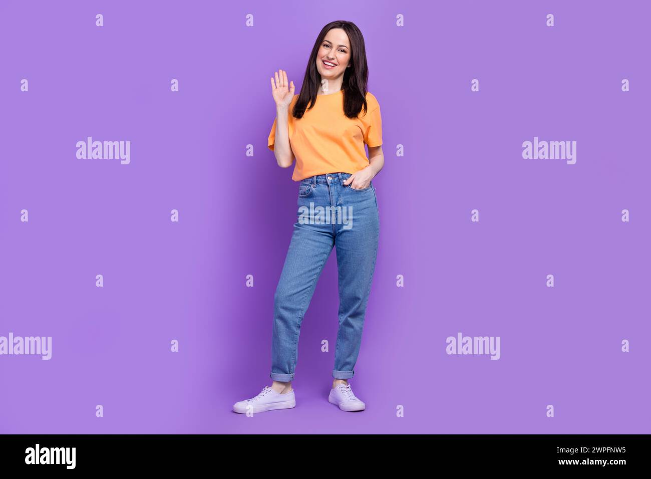 Full length body photo of sales manager woman in orange t shirt waving ...