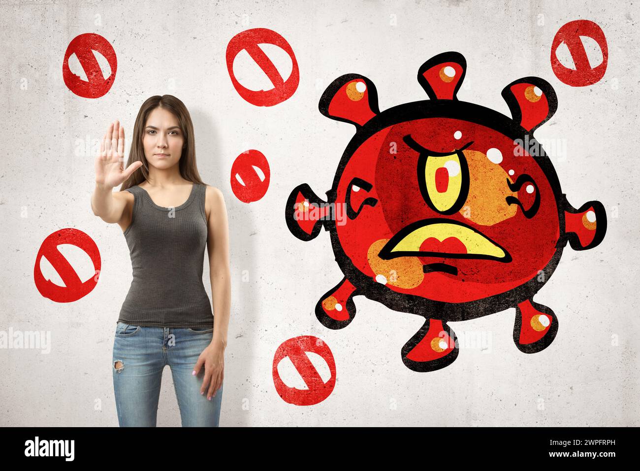 Young brunette girl making stop gesture with red angry cartoon germ ...
