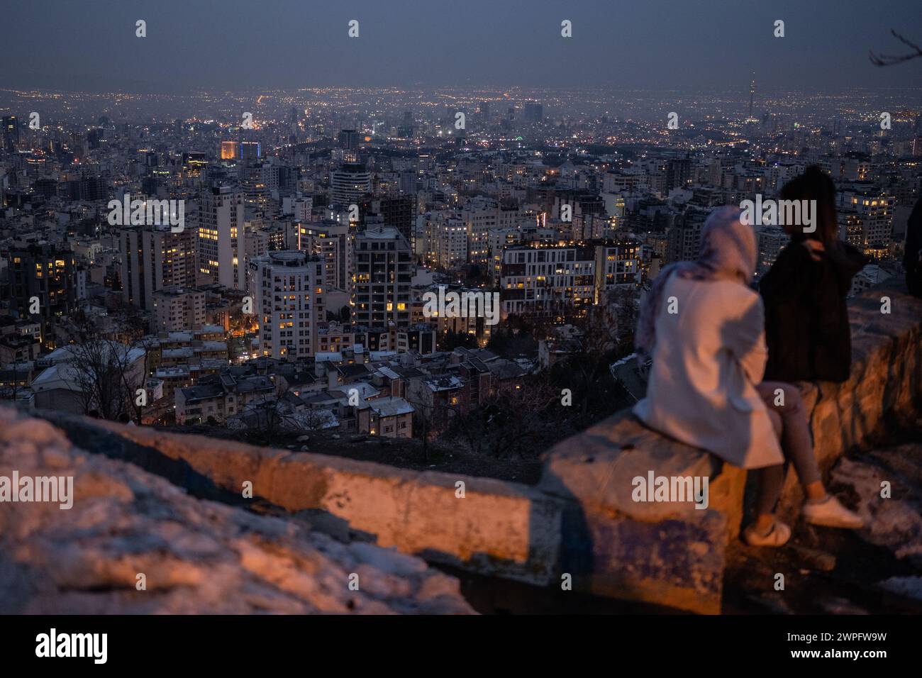 Teheran, Iran. 07th Mar, 2024. Two women look out over the metropolis ...