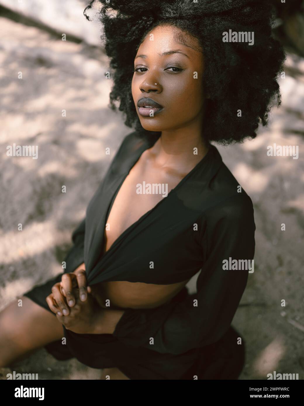 Fashion outdoor beach portrait Beautiful young African American Black woman posing outside on ...