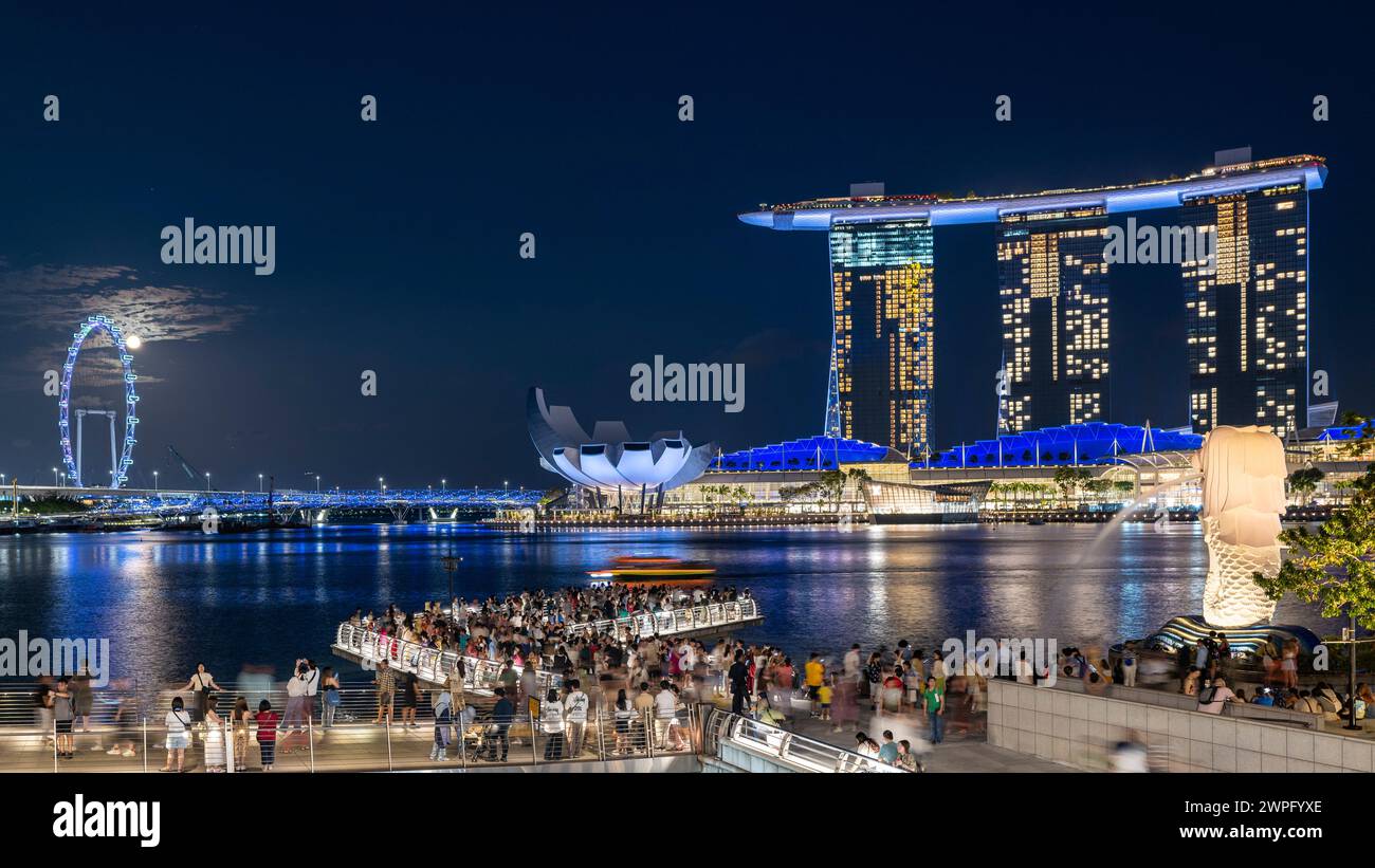 Singapore Flyer With The Merlion And Marina Bay Sands, At Full Moon In ...