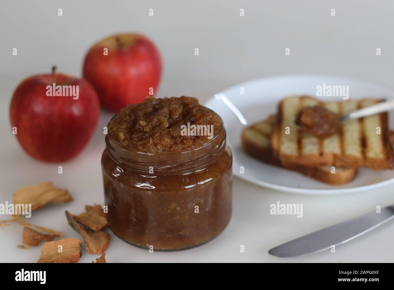 Delicious homemade apple jam in glass jar. Fresh fruit preserve, autumn ...