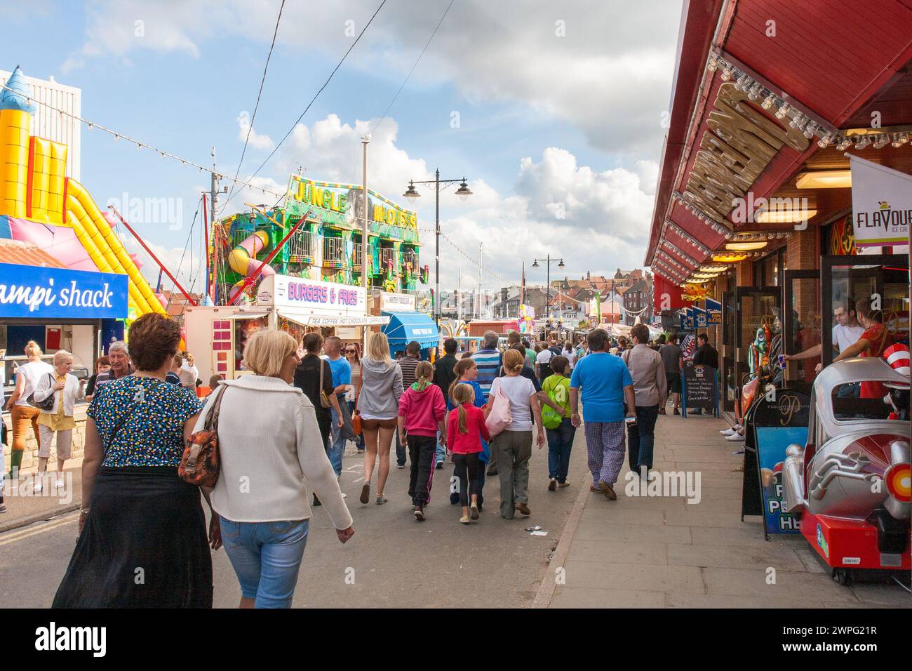 Tourists at Whitby harbour Stock Photo - Alamy