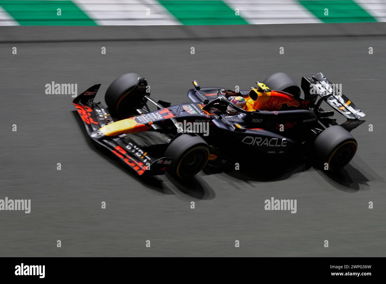 Red Bull driver Sergio Perez of Mexico steers his car during the second practice session ahead ...