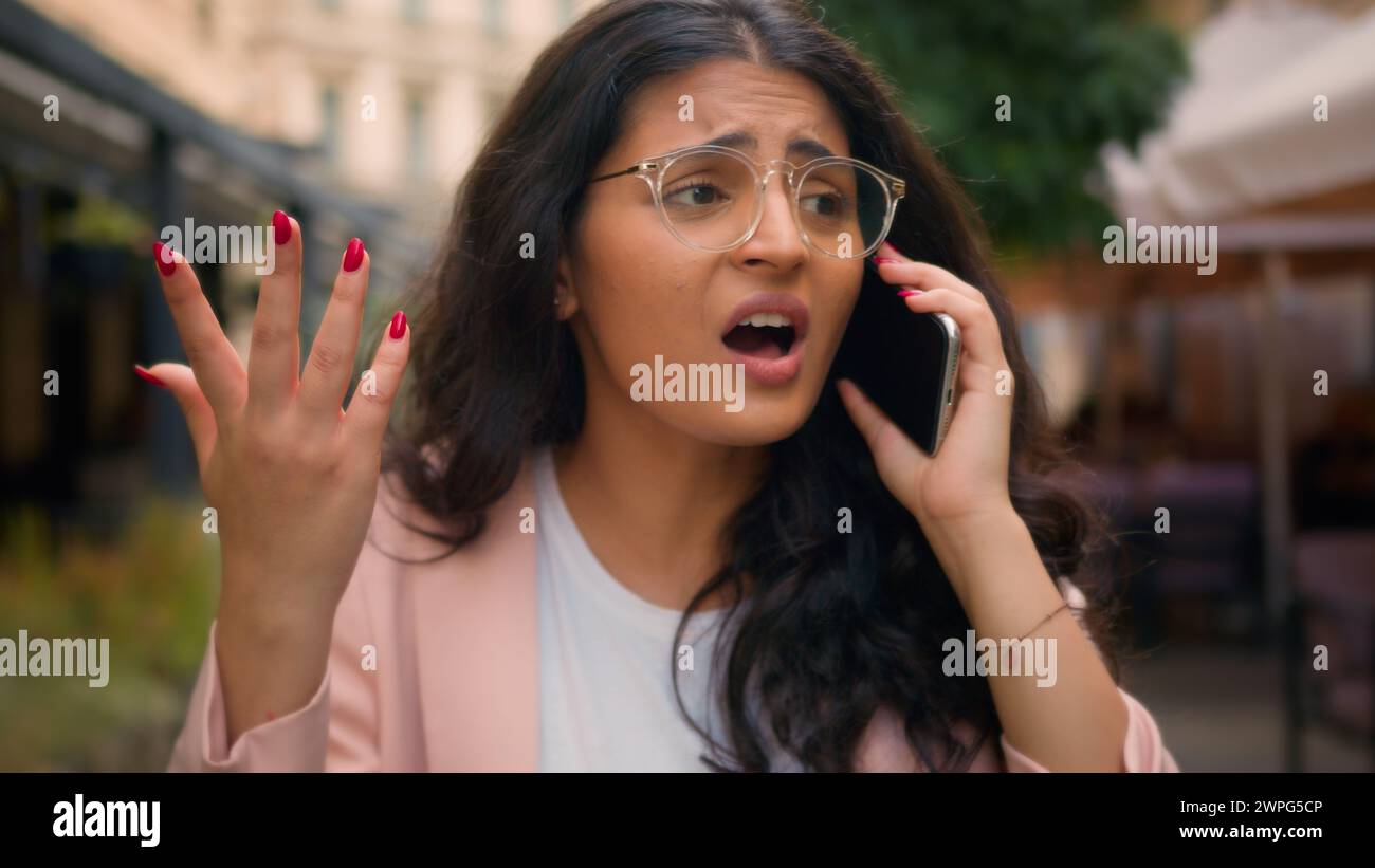 Mad angry stressful Indian Arabian ethnic woman businesswoman lady ...