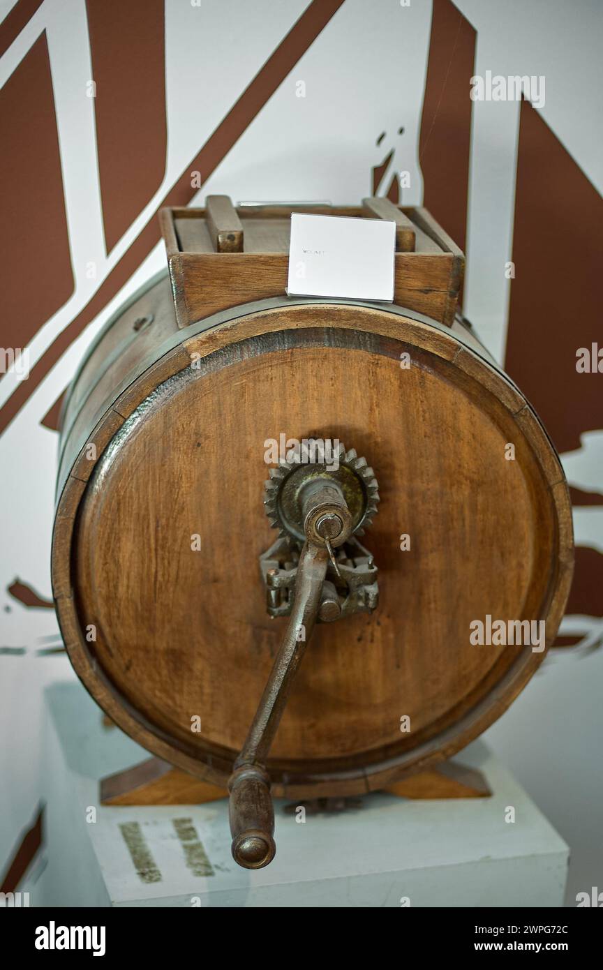 Close-up of an antique machine used in the chocolate making process ...