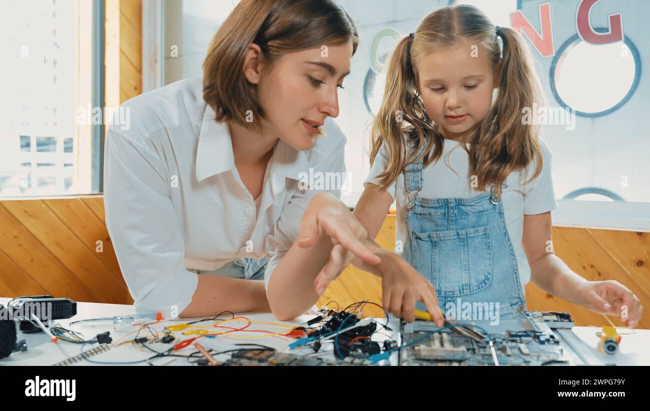 Young smart caucasian teacher teaching students about part of ...