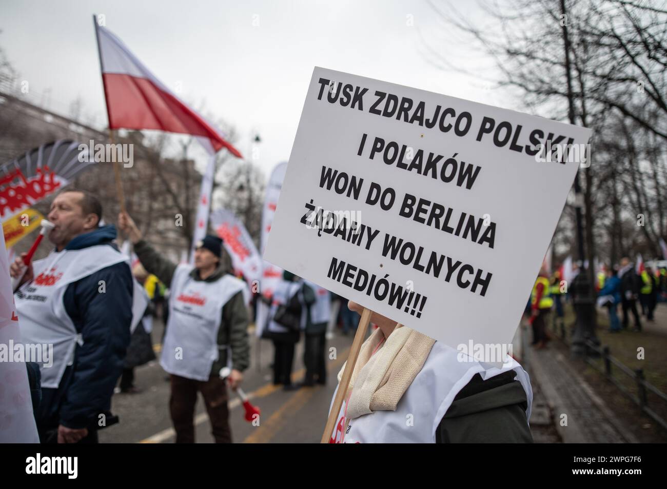 A protester holds a placard expressing her opinion during the ...