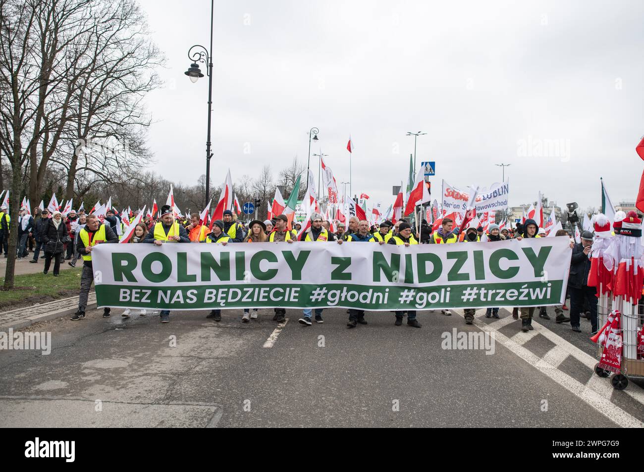 Protesters march with flags and banners expressing their opinion during ...