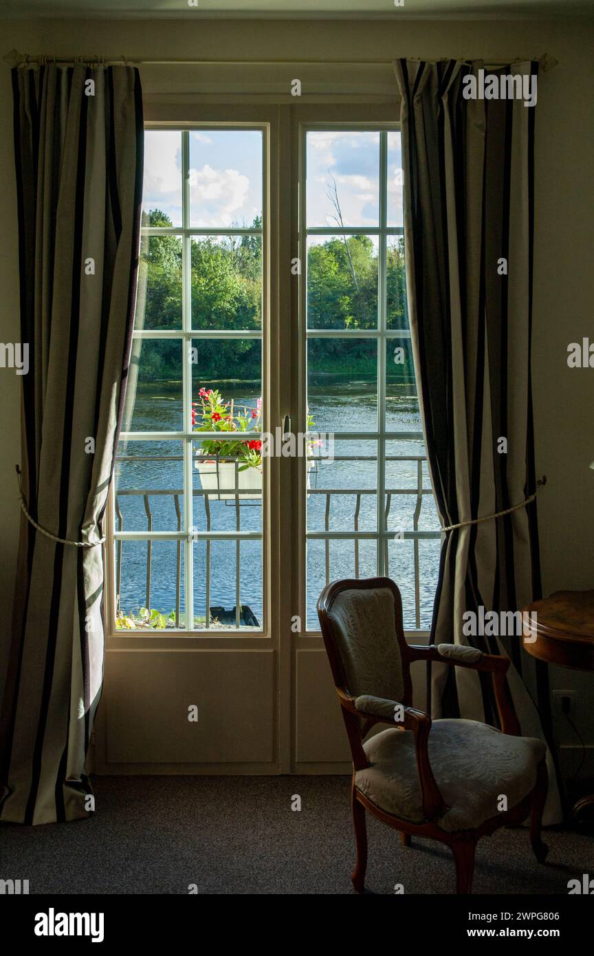 A view of a river through a window Stock Photo - Alamy