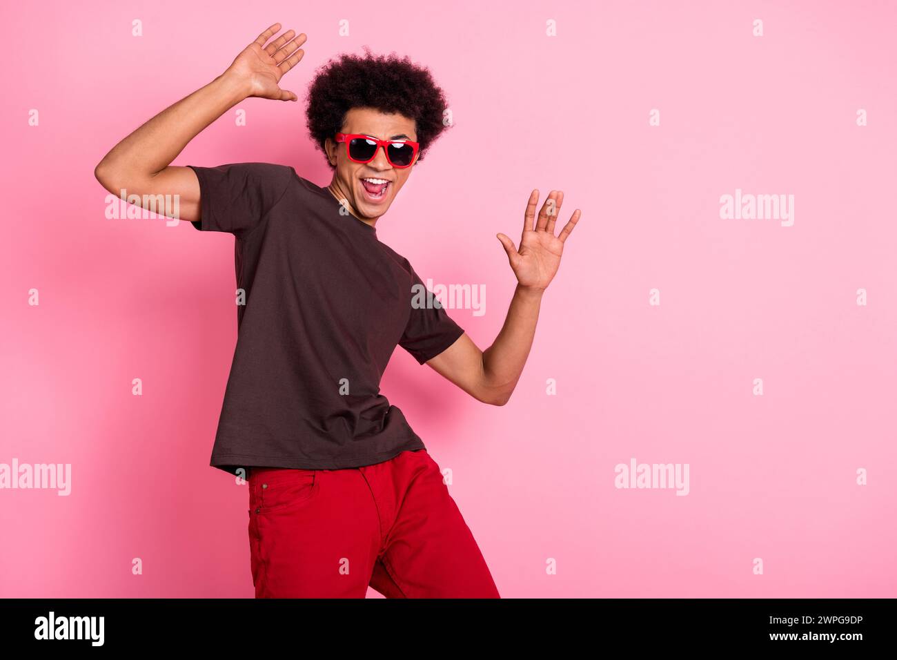 Photo of positive young man enjoy the rhythm late night club ...