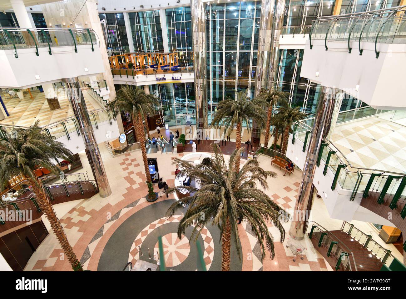 Doha qatar indoor people shopping center hi-res stock photography and ...