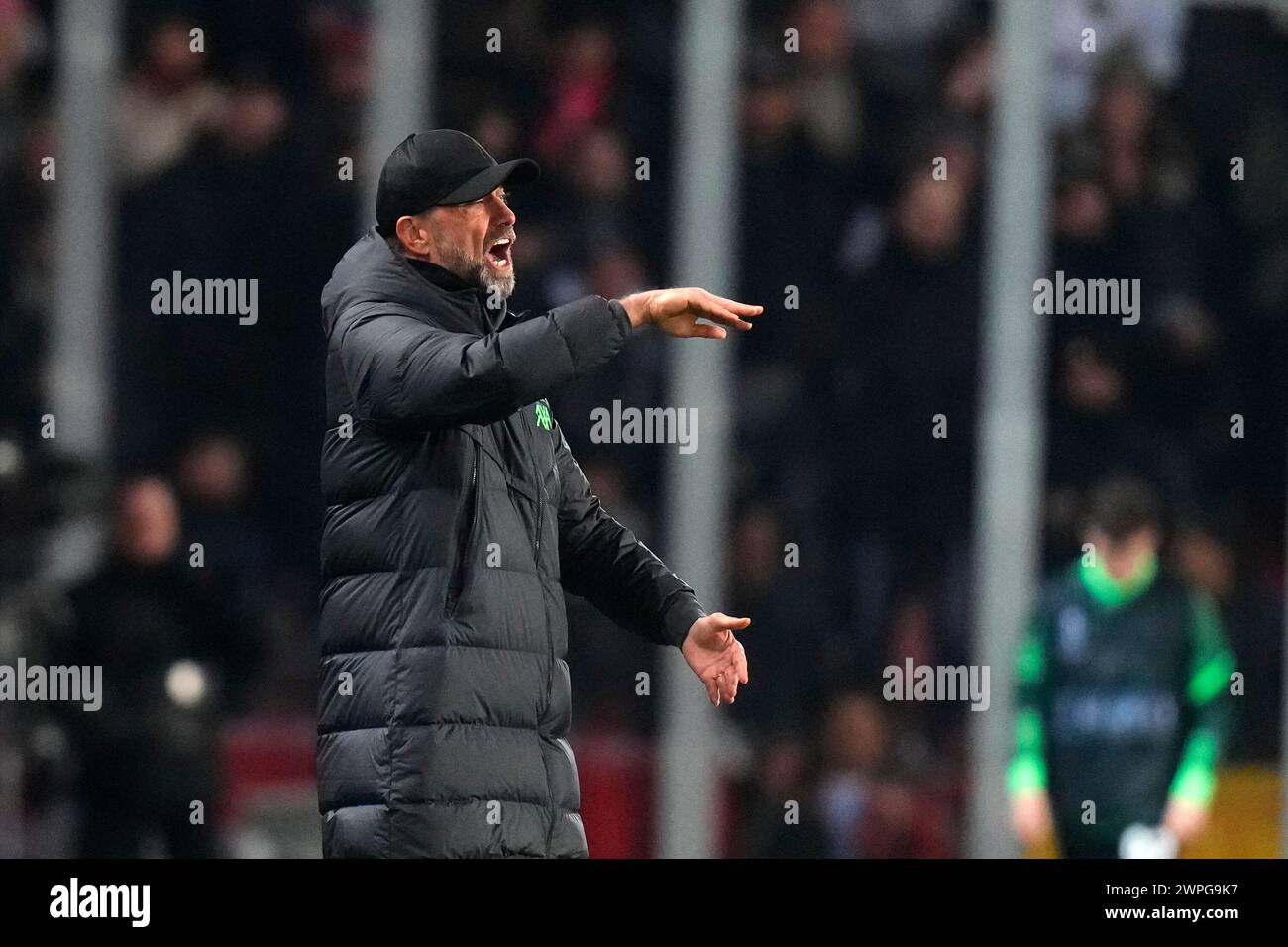 Liverpool's manager Jurgen Klopp gestures to his players from the ...