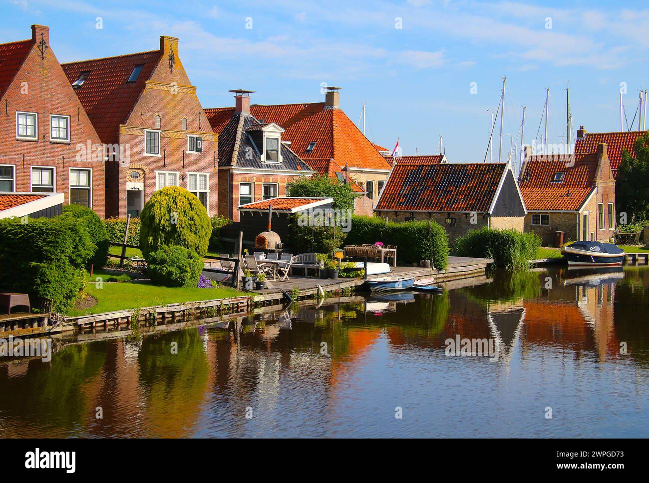Gable architecture of typical Dutch residential homes along canal ...