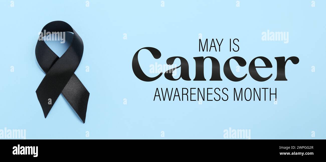Black ribbon and text MAY IS CANCER AWARENESS MONTH on light blue ...