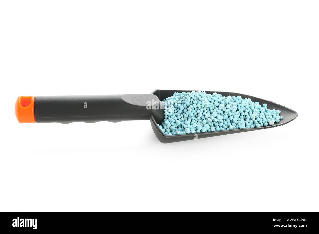 Gardening shovel with blue granular fertilizer isolated on white ...