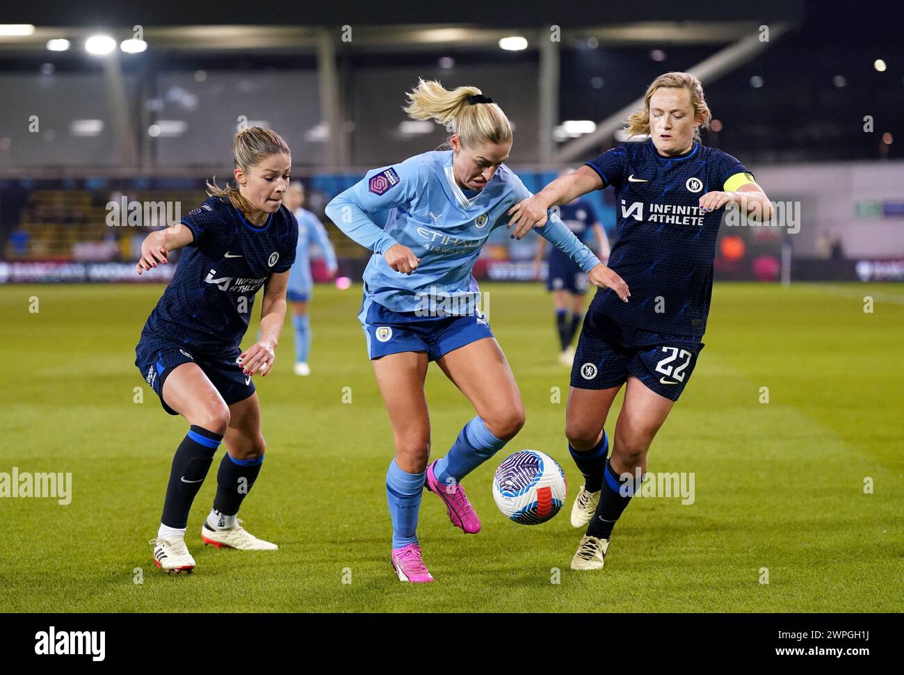 Manchester City's Laura Coombs (centre) battles with Chelsea's Melanie ...