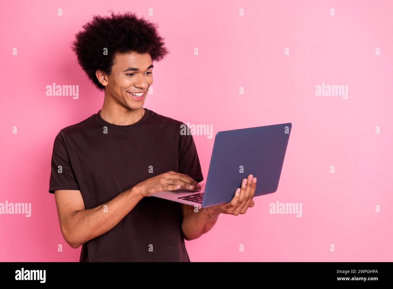 Photo of young curly hair guy junior level programmer it specialist ...