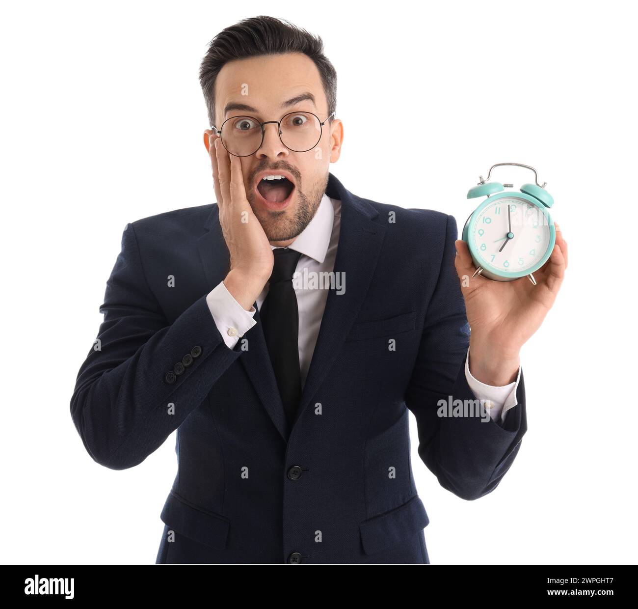 Funny shocked businessman with alarm clock isolated on white background ...