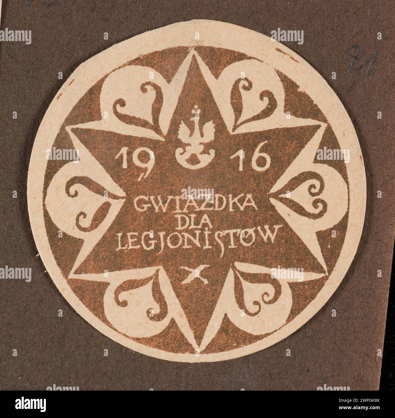 Round stamp from 1916 showing the Polish emblem in a star with text ...