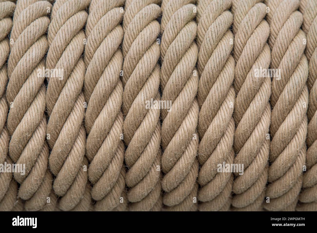 Texture of a spool of light brown rope Stock Photo - Alamy