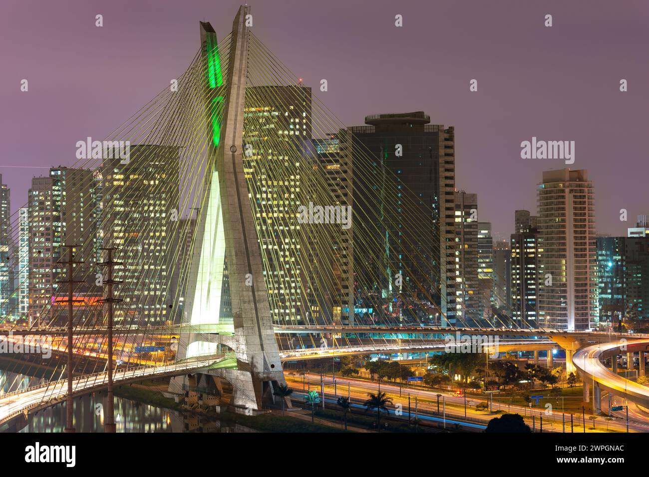 Octavio Frias de Oliveira; bridge and skyline of Sao Paulo at night ...