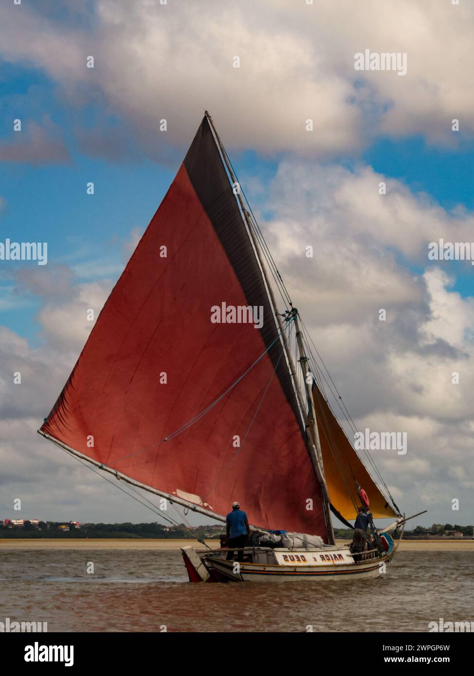 A traditional sailboat from the state of Maranhão, Brazil, sailing in ...