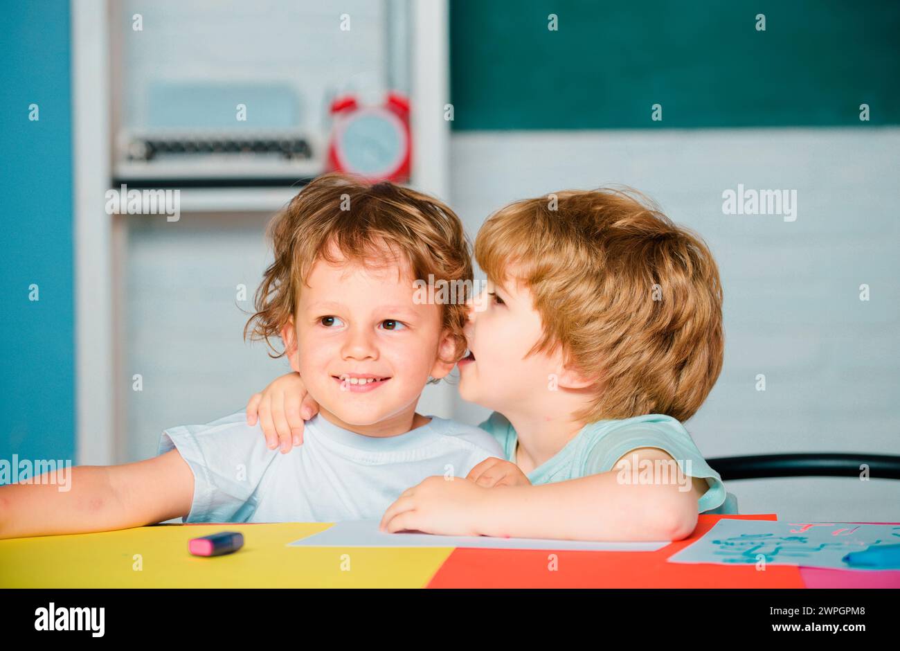 Kids freinds gets ready for school. Funny little children having fun on ...