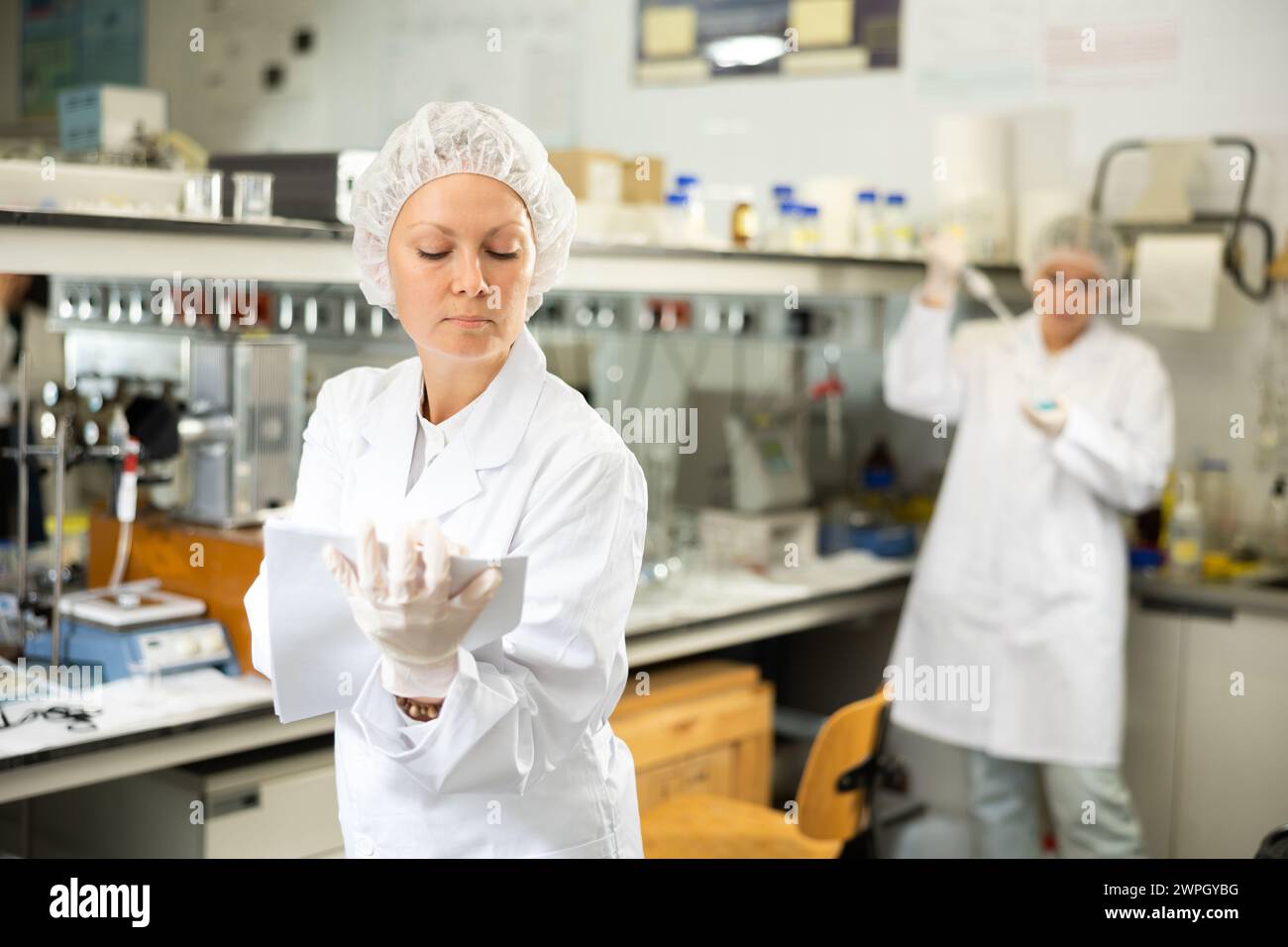Lab expert making chemical experiment hi-res stock photography and ...