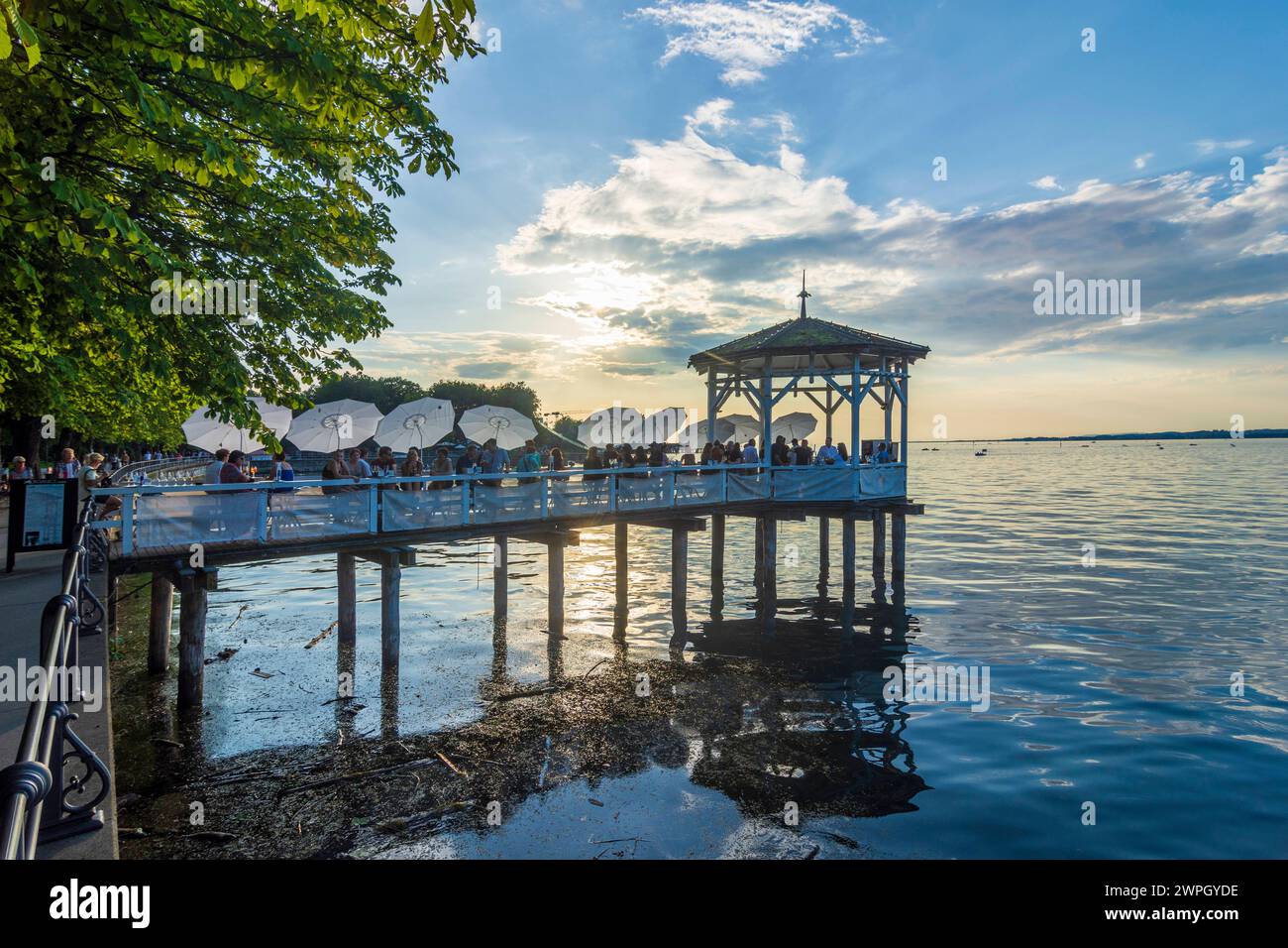 lake Bodensee Lake Constance, bridge Fischersteg with bar Bregenz ...