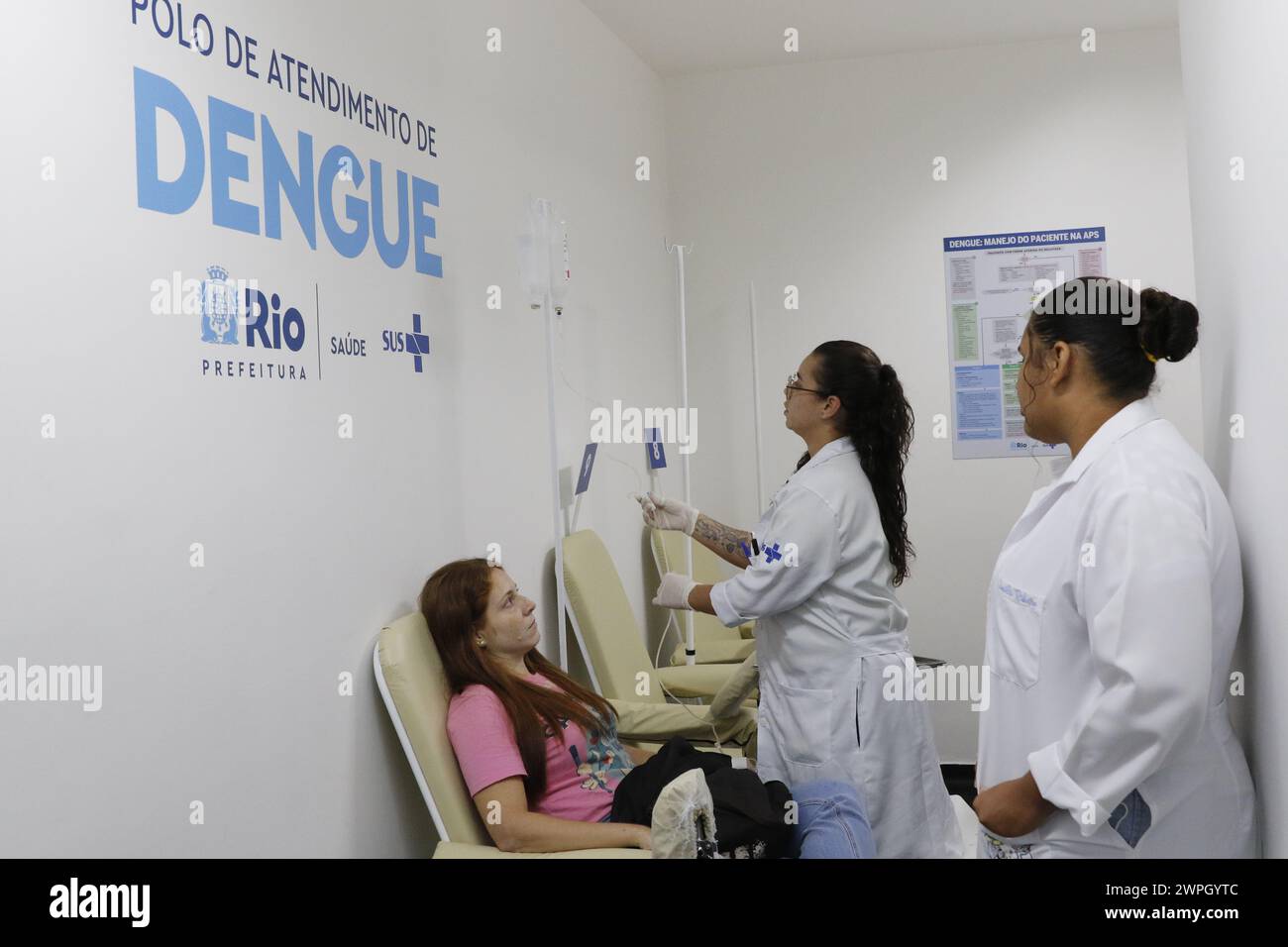 Patients with dengue fever and symptoms of the disease seek medical ...