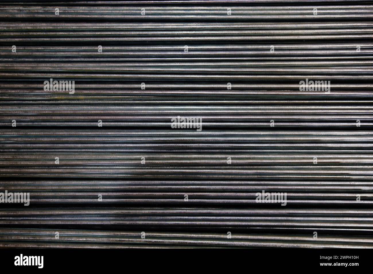 Group of threaded steel rods, abstract background Stock Photo - Alamy