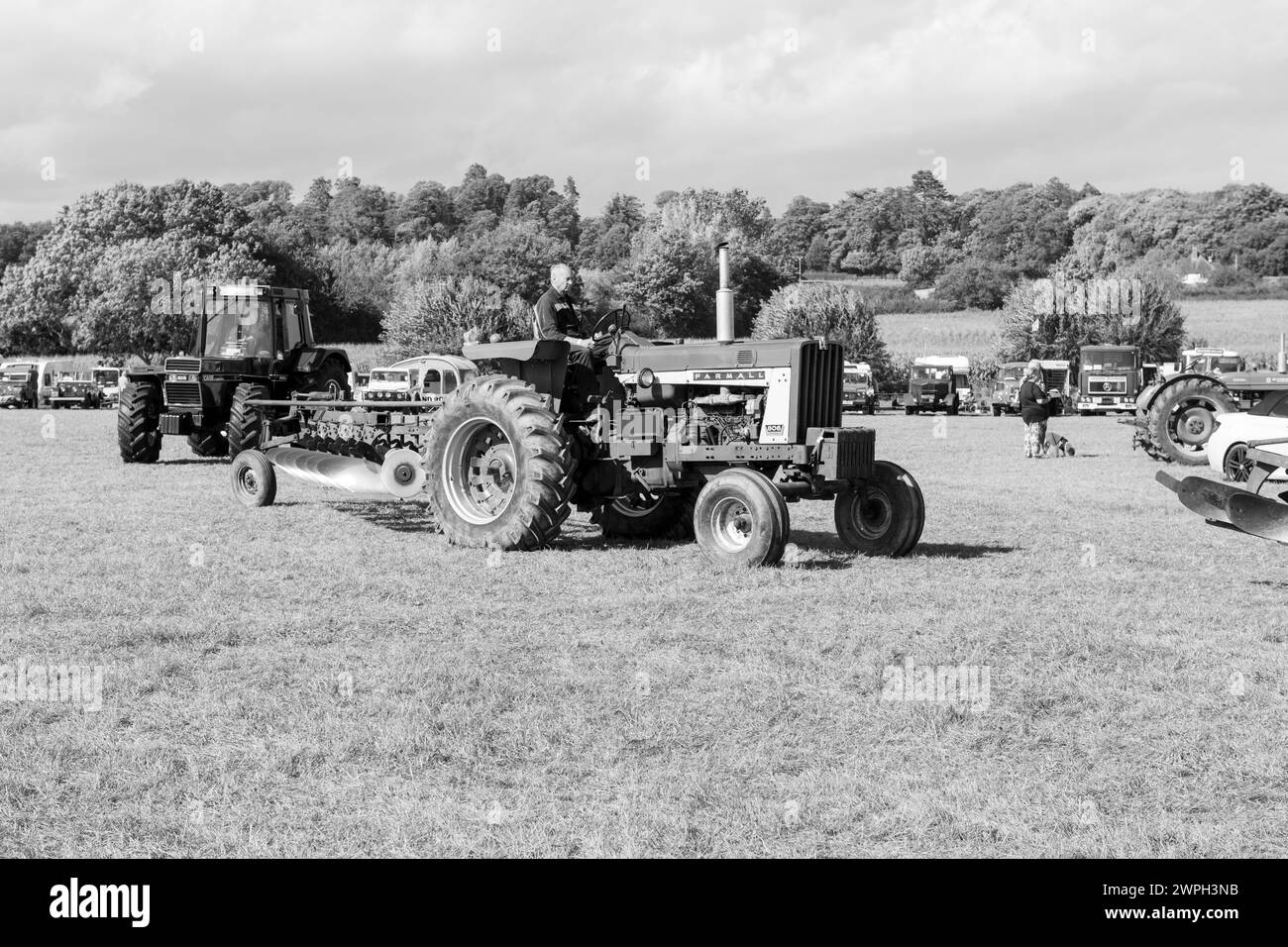 Red and white farmall tractor Black and White Stock Photos & Images - Alamy