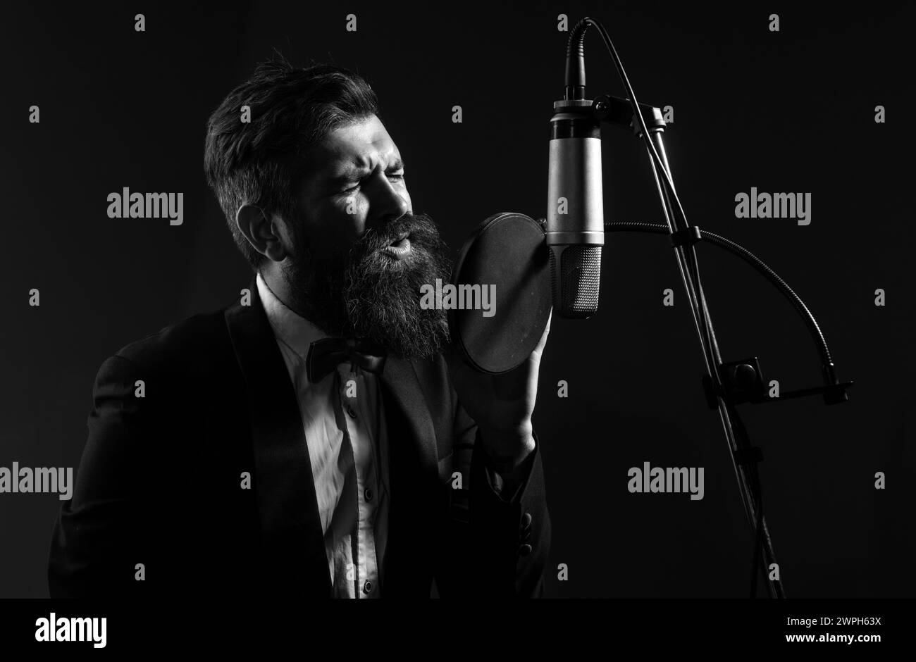 Man headphones music recording Black and White Stock Photos & Images ...