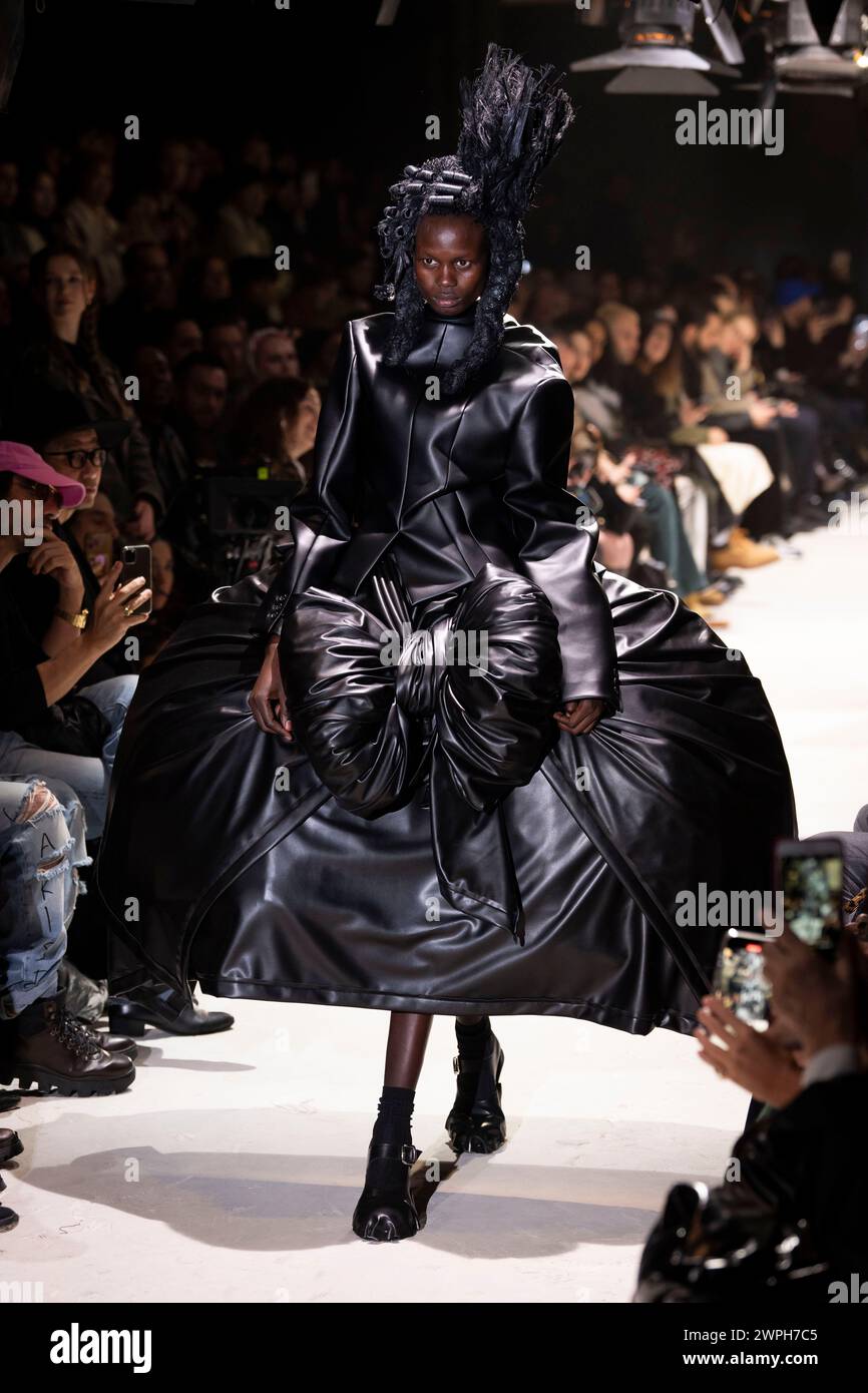 A model wears a creation as part of the Comme Des Garcons Fall/Winter ...