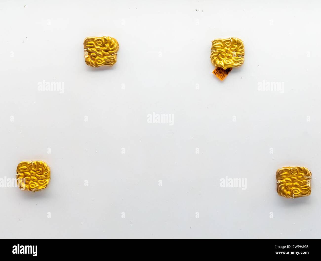 Gold decorations with the image of paired heads of rams, 6th- 5th ...
