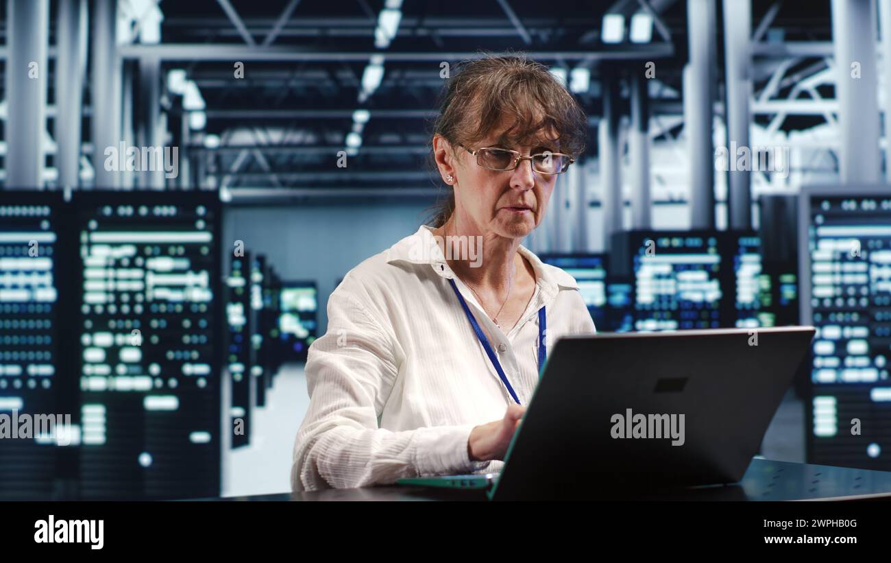 Licensed worker working in server room housing GPU dedicated ...