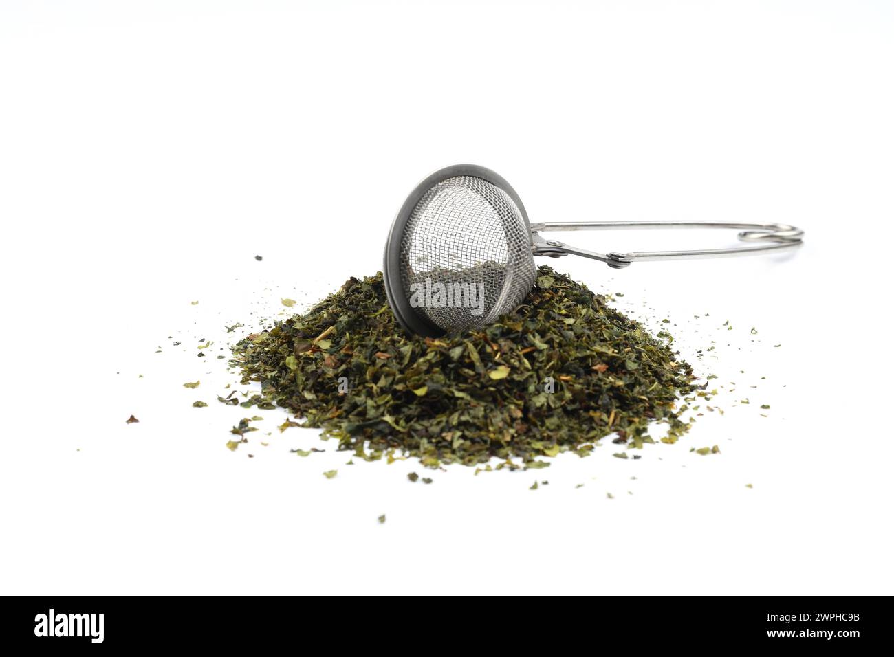Green tea with herbs in sieve on a White Background Stock Photo - Alamy