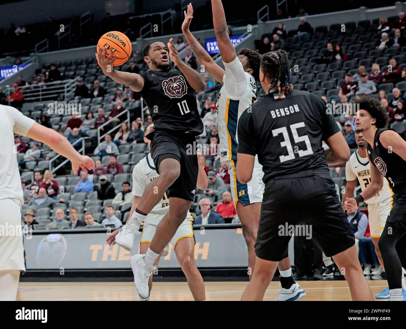 Missouri State guard Damien Mayo Jr. (10) shoots as Murray State guard ...