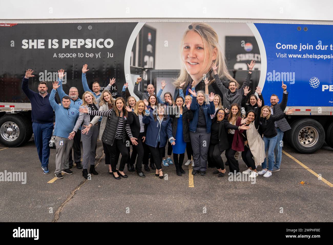 IMAGE DISTRIBUTED FOR PEPSICO - Pepsi employees pose around Brenda ...
