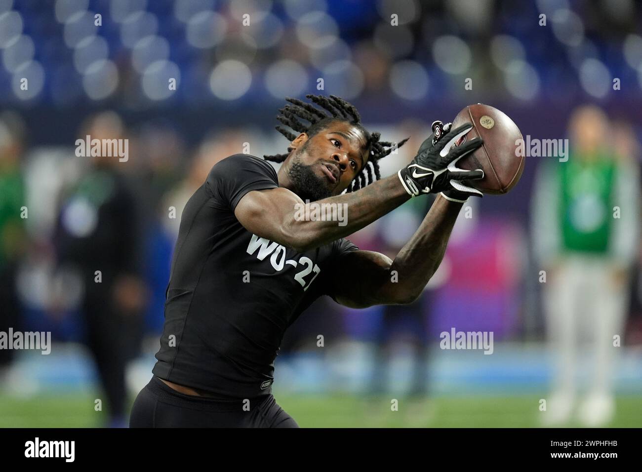Georgia wide receiver Marcus Rosemy-Jacksaint runs a drill at the NFL football scouting combine ...