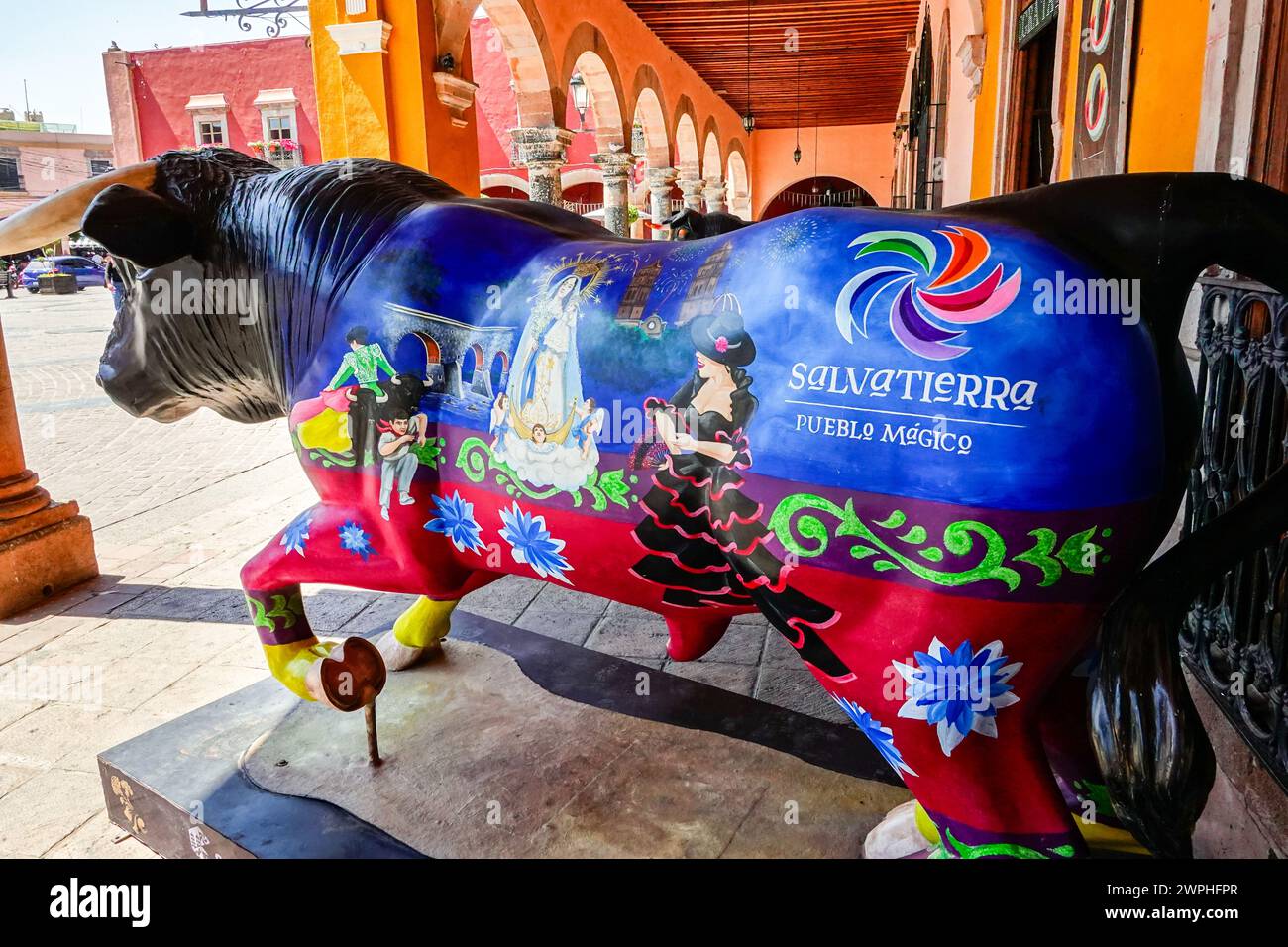Individually painted bull statues line the Portales del Carmen along ...