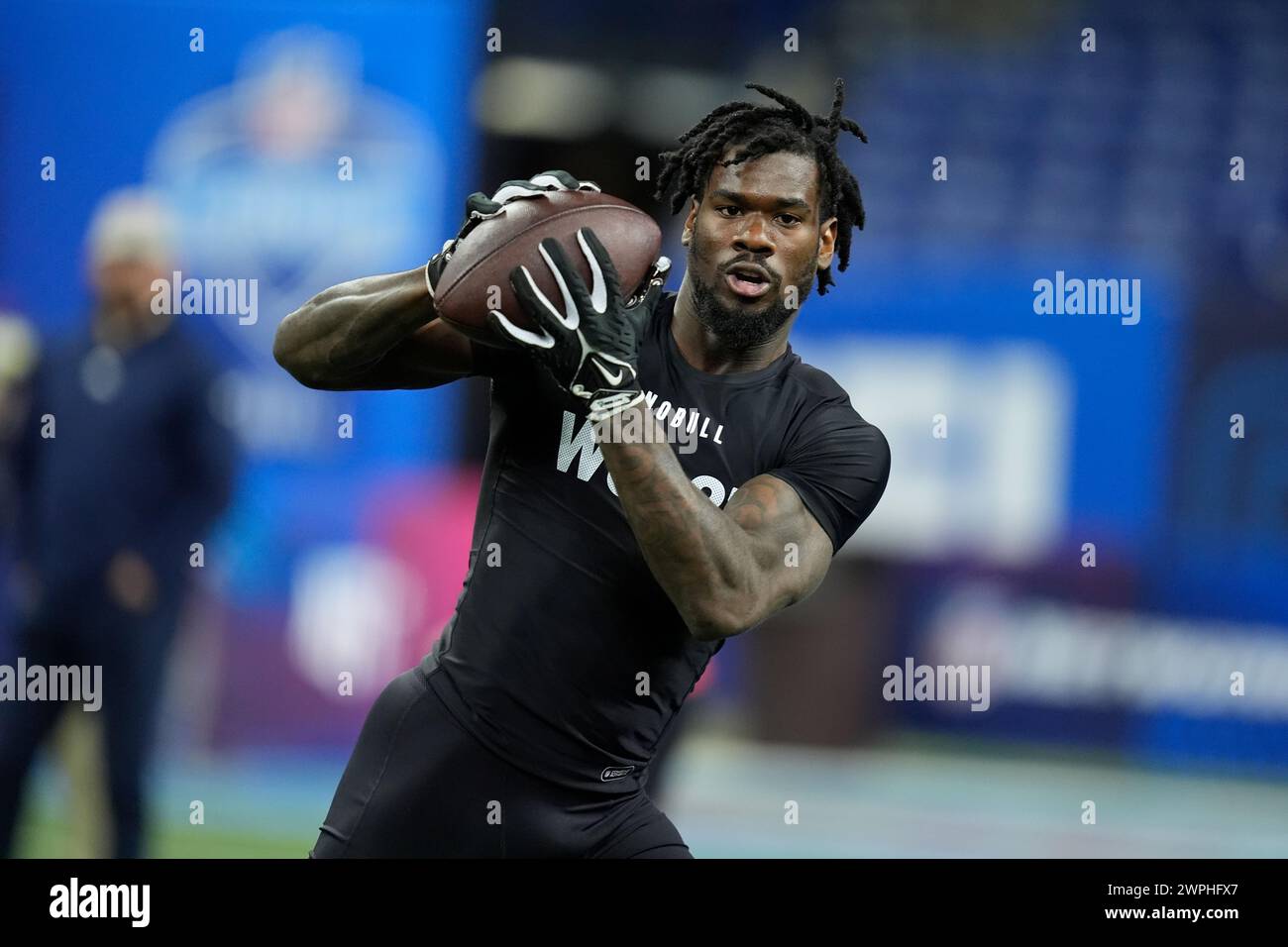 Georgia wide receiver Marcus Rosemy-Jacksaint runs a drill at the NFL football scouting combine ...
